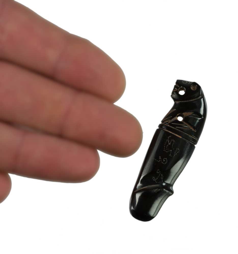 Palad Khik: Amulette Phallique Thaïlandaise avec Tête de Lion